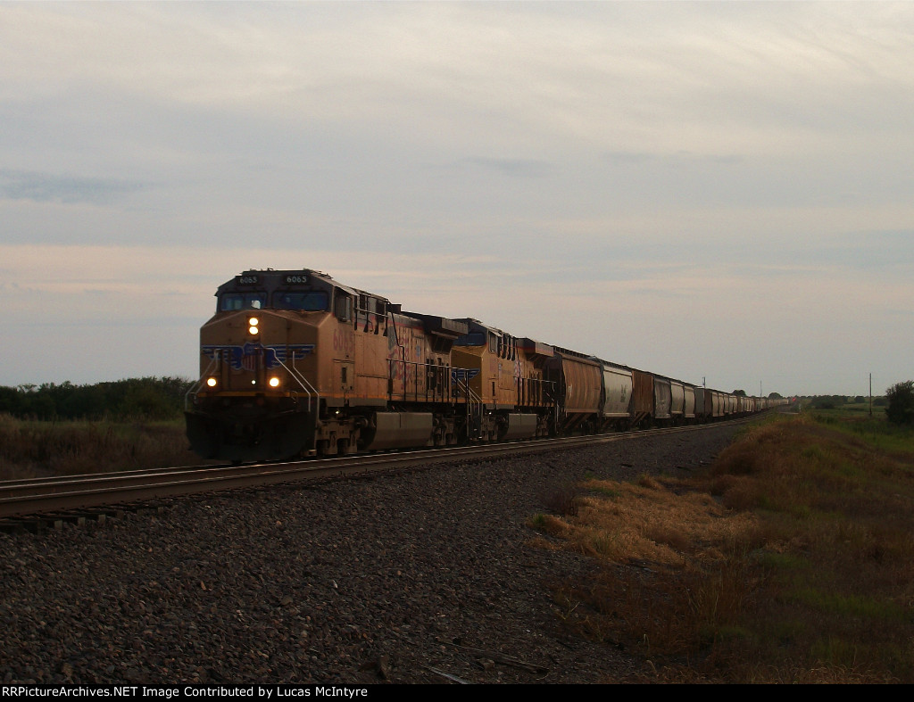 UP 6065 eastbound UP empty grain train